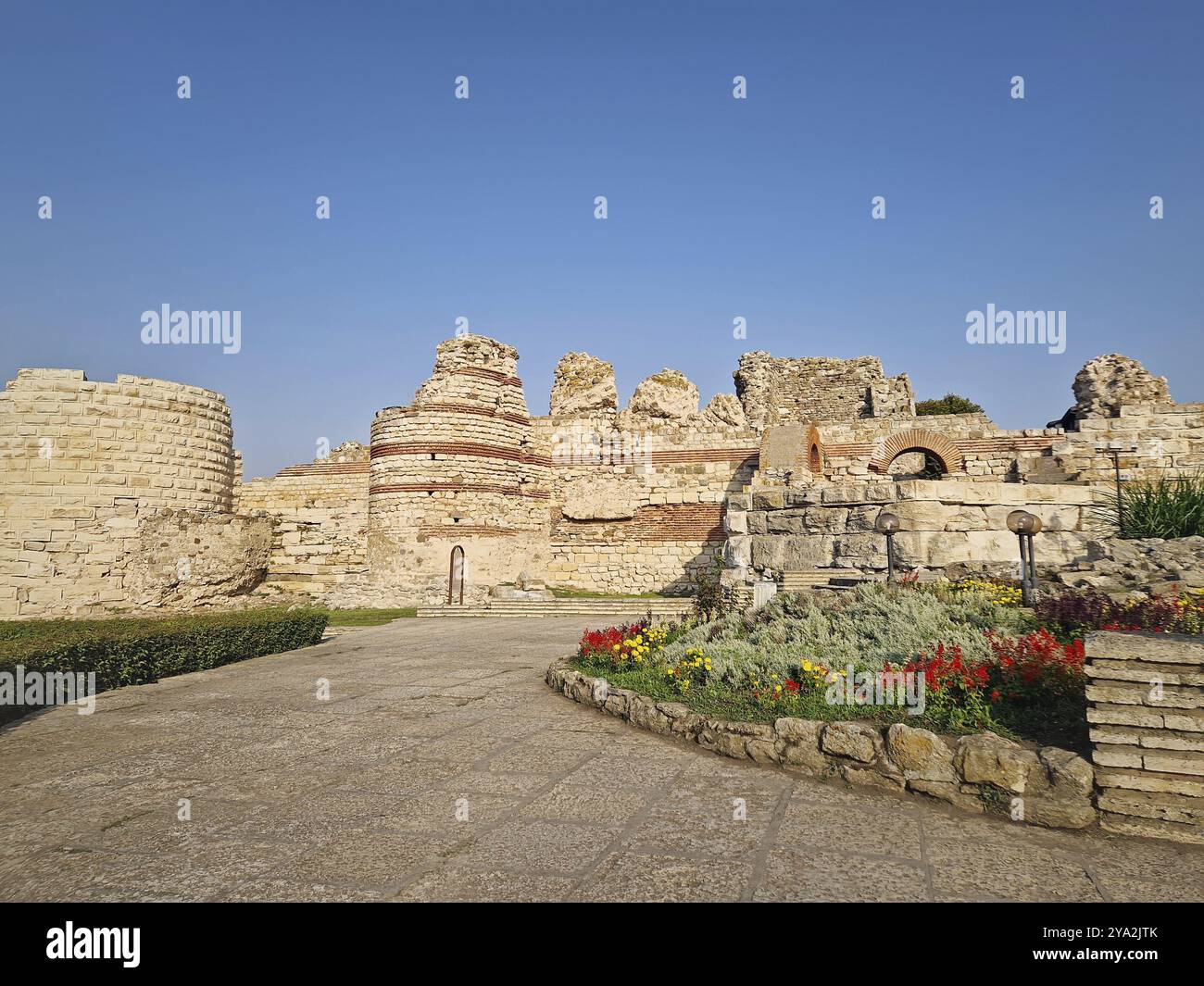 Ancient ruins of Nessebar, weathered brick and stone walls remnants of ...