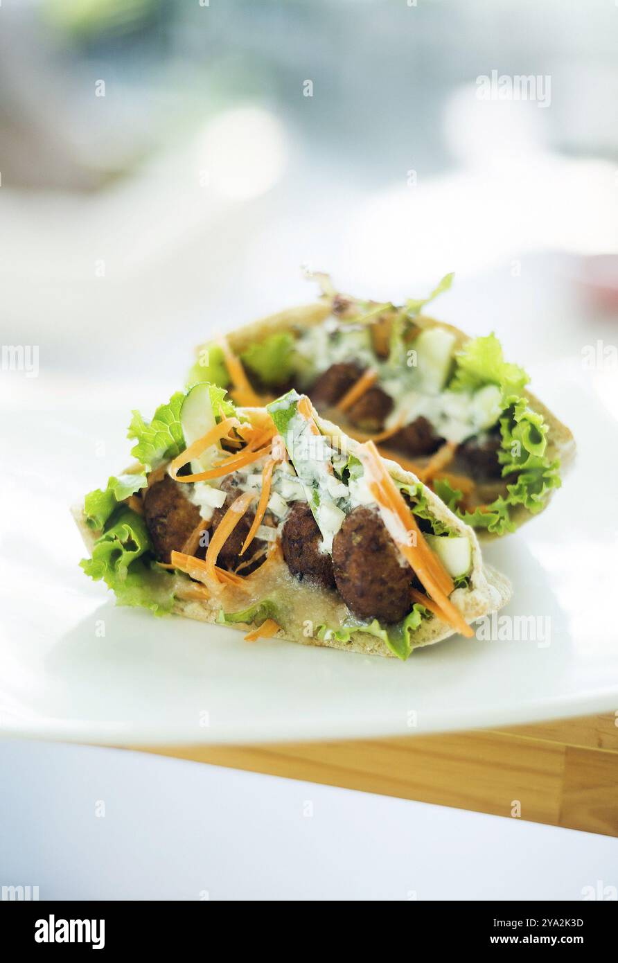 Healthy vegetarian falafel and salad in pita bread sandwich Stock Photo ...