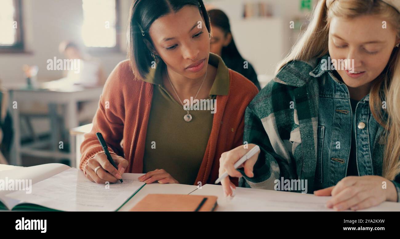 Education, help and friends writing notes in classroom with studying ...