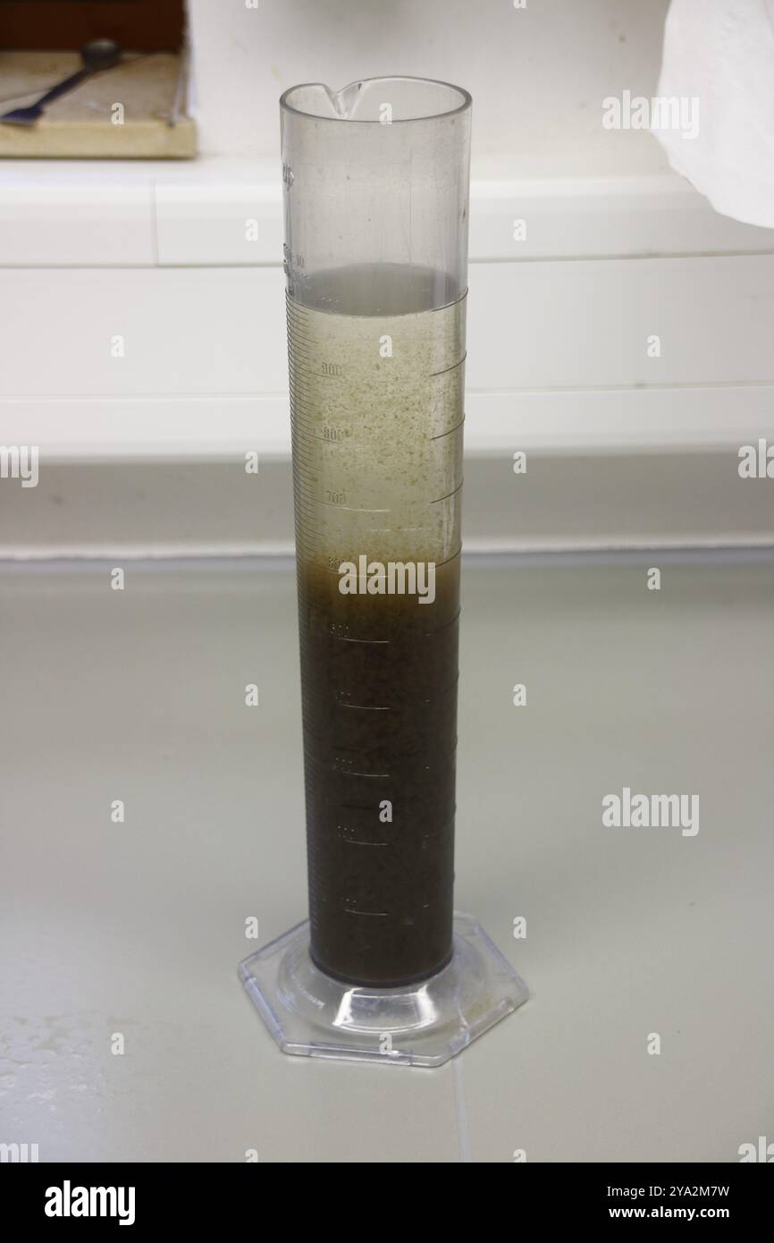 Settling sample in the laboratory of a sewage treatment plant to ...