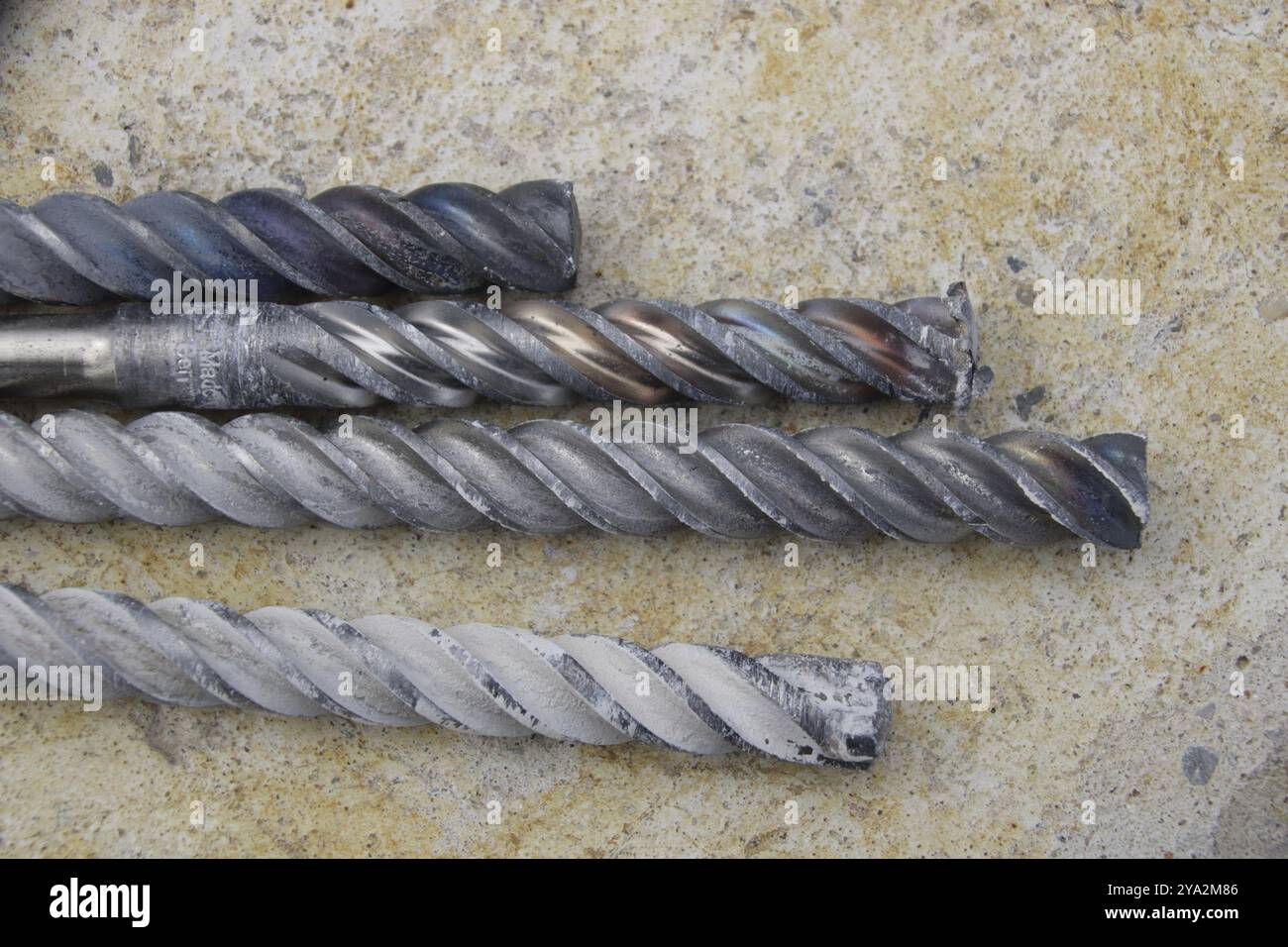 Drill bits for concrete are blunt and burnt at the tip Stock Photo - Alamy
