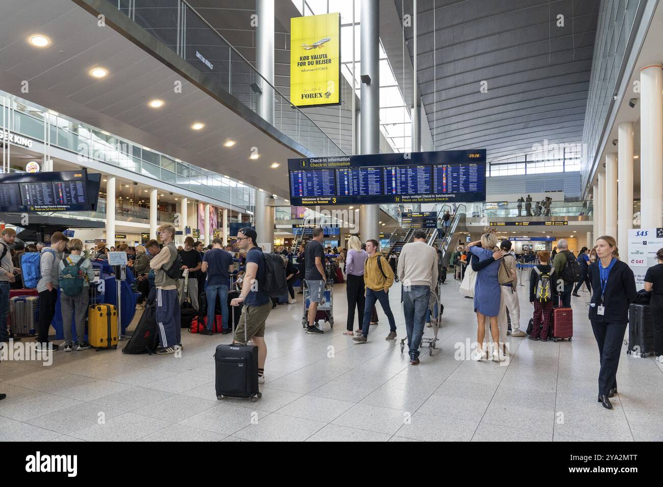 Copenhagen, Denmark, July 16, 2023: Group of people inside the check in ...