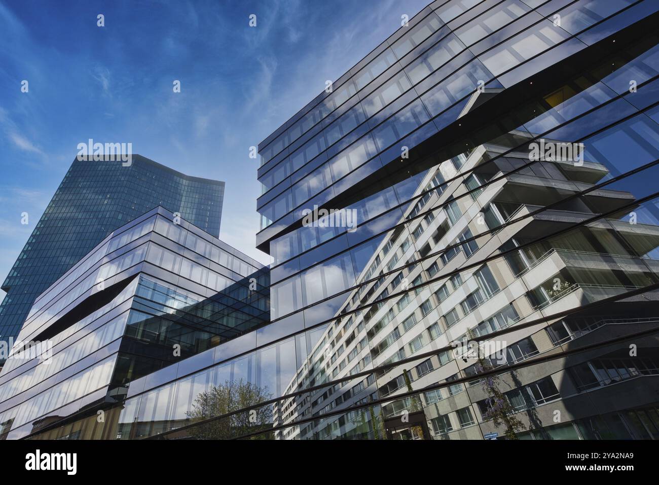 Modern glass building with impressive reflection of the blue sky in the city, Prime Tower ...
