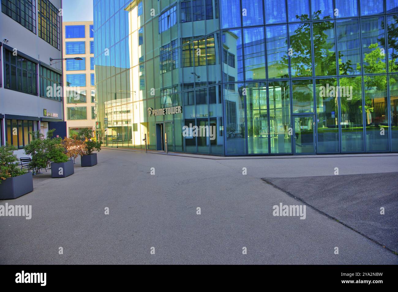 Glass building of the Prime Tower with reflective surfaces and empty ...