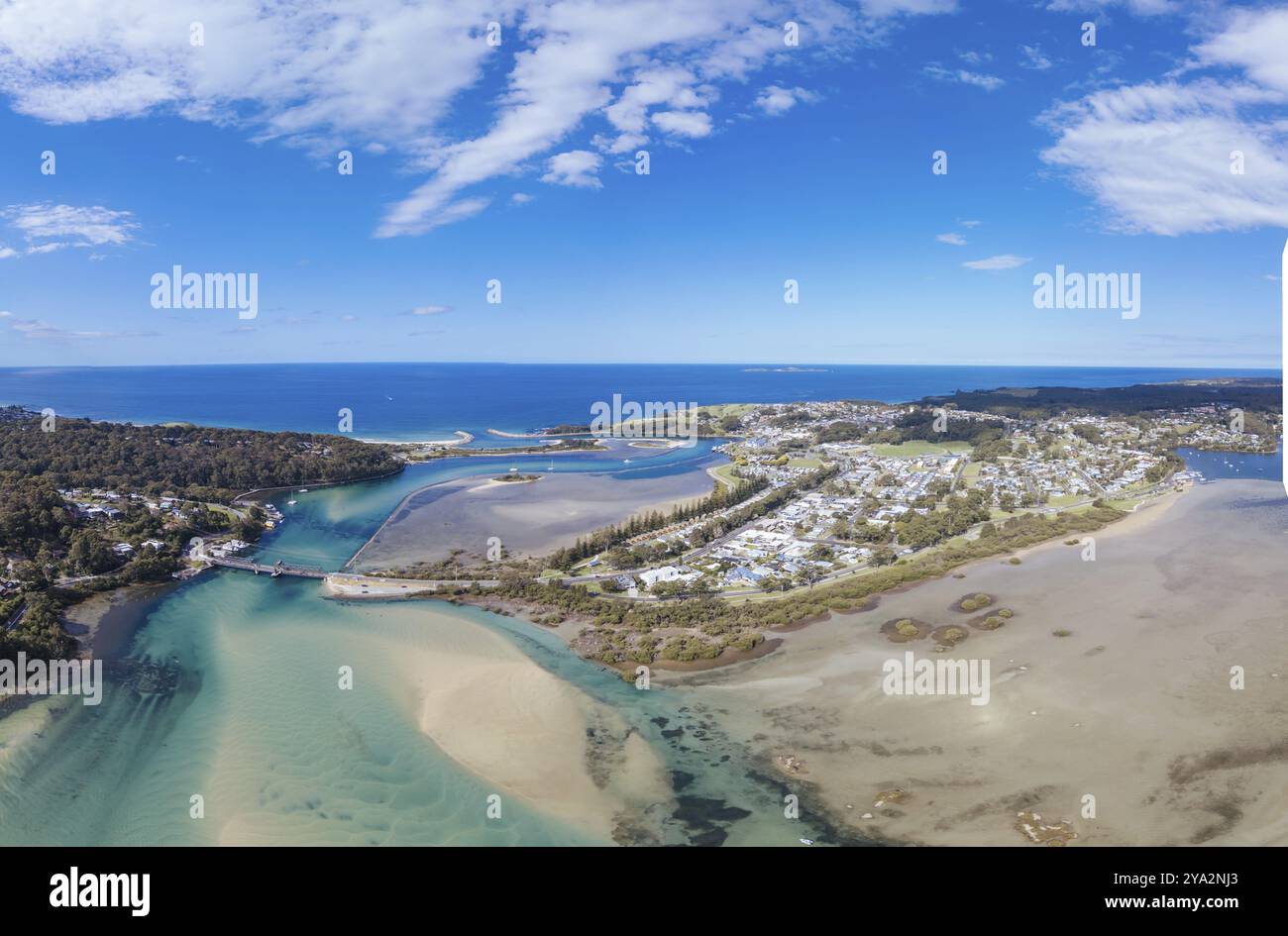 Aerial view of the idyllic coastal town of Narooma wrapped around the ...