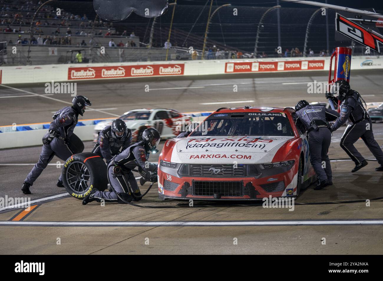 NASCAR Cup Series driver, TODD GILLILAND and crew make a pit stop ...