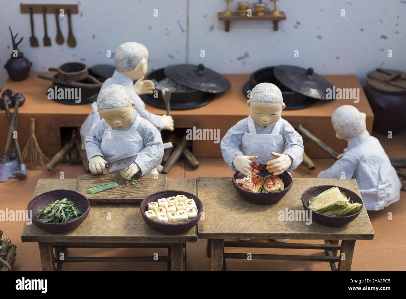 Korean monk figures preparing traditional korean food Stock Photo - Alamy