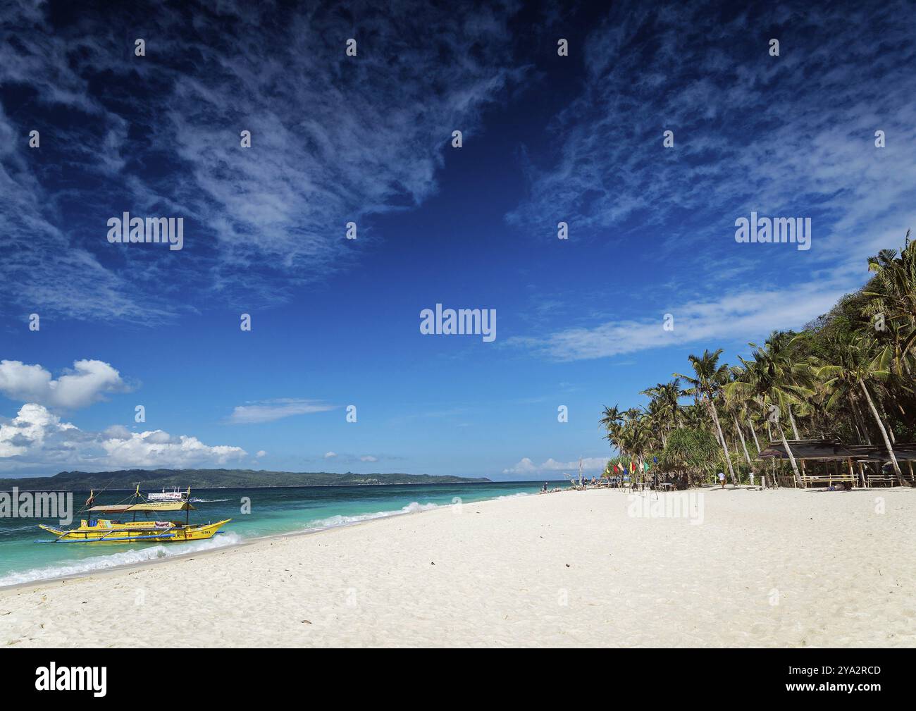 Traditional filipino asian ferry taxi tour boats on puka beach in ...
