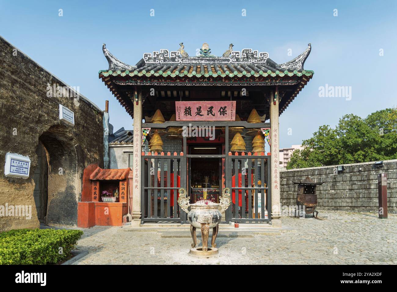 Chinese temple next to ruins of st.paul in macau china Stock Photo - Alamy