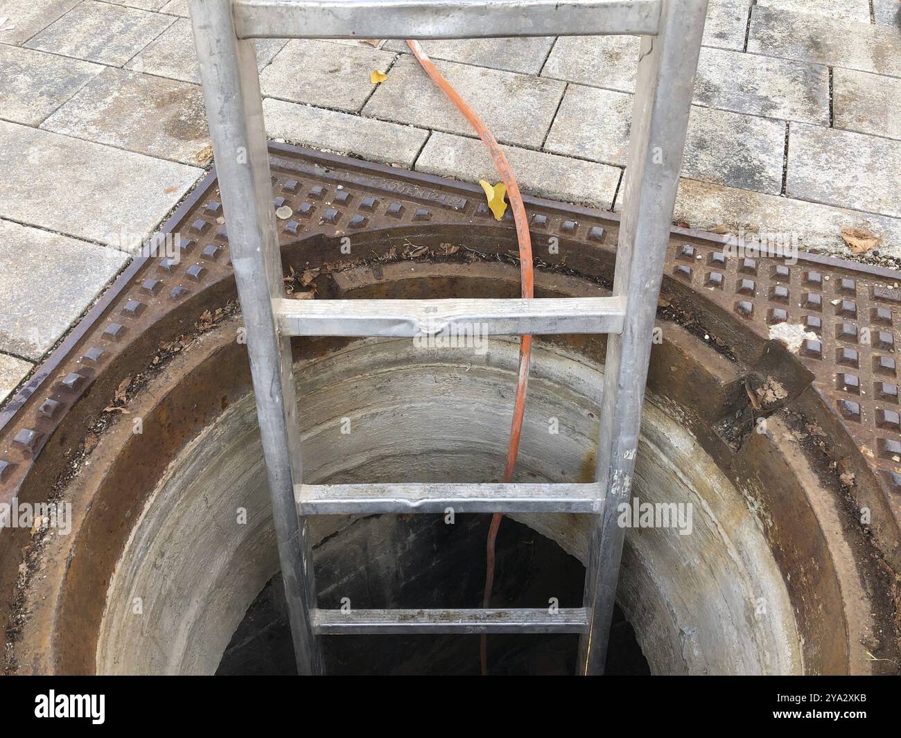 Ladder was inserted into a shaft for maintenance Stock Photo - Alamy