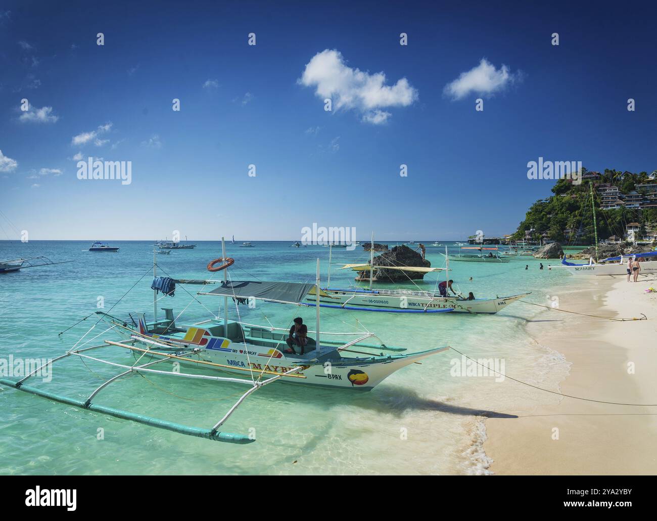 Tourist water taxi tour boats in paradise diniwid beach boracay ...