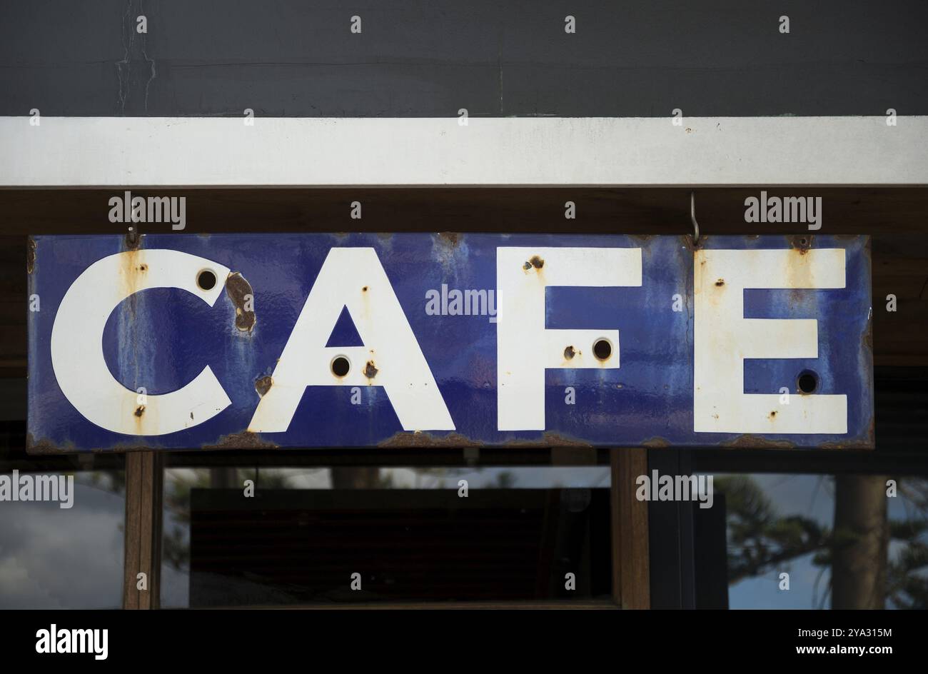 Old rusty cafe sign Stock Photo - Alamy