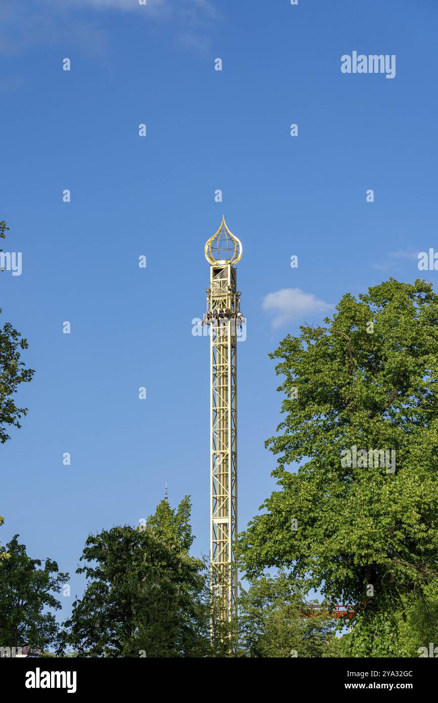 Copenhagen, Denmark, May 28, 2023: Golden Tower Ride at the historic ...