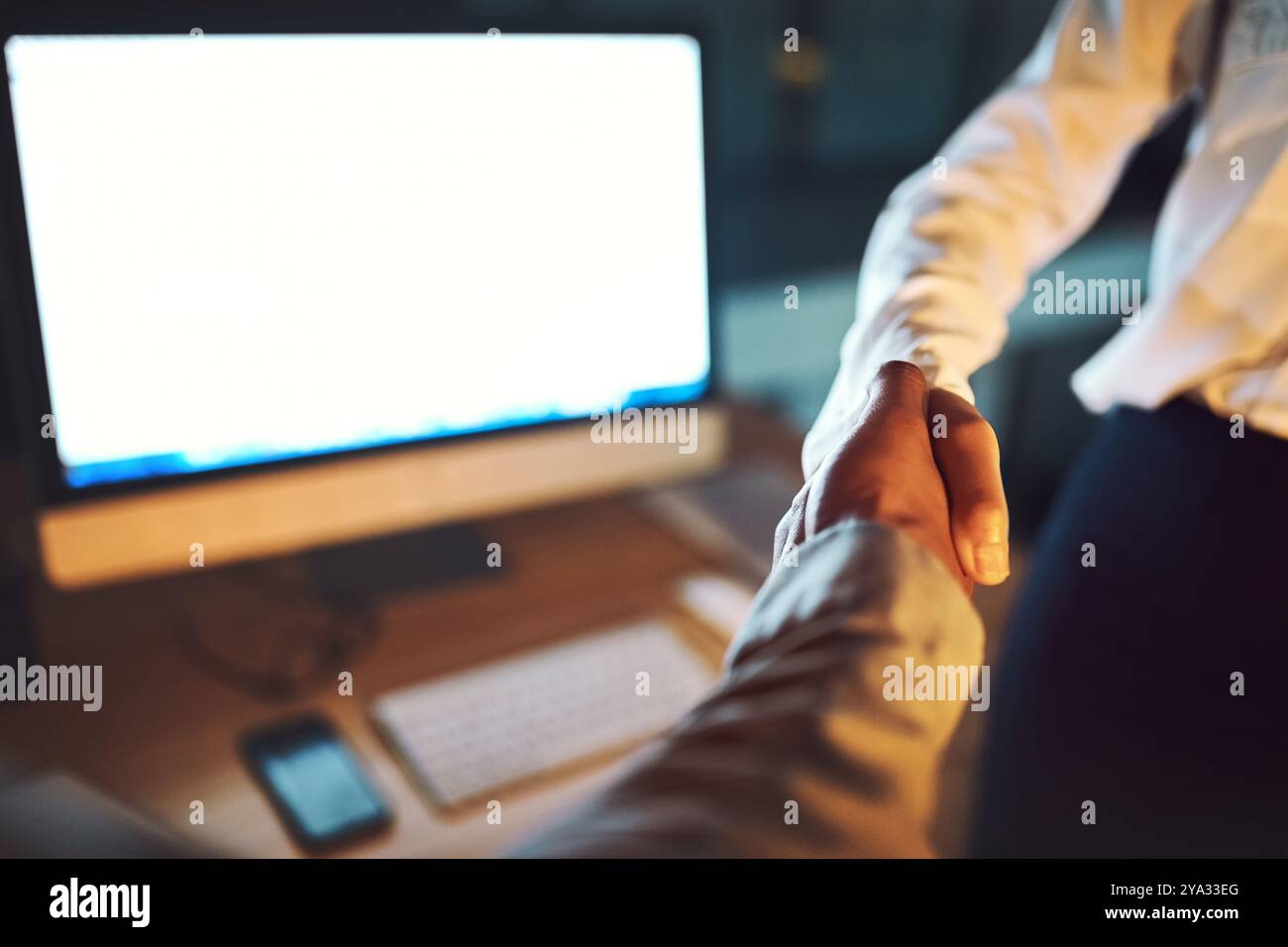 Screen, computer and business people with handshake, night and ...