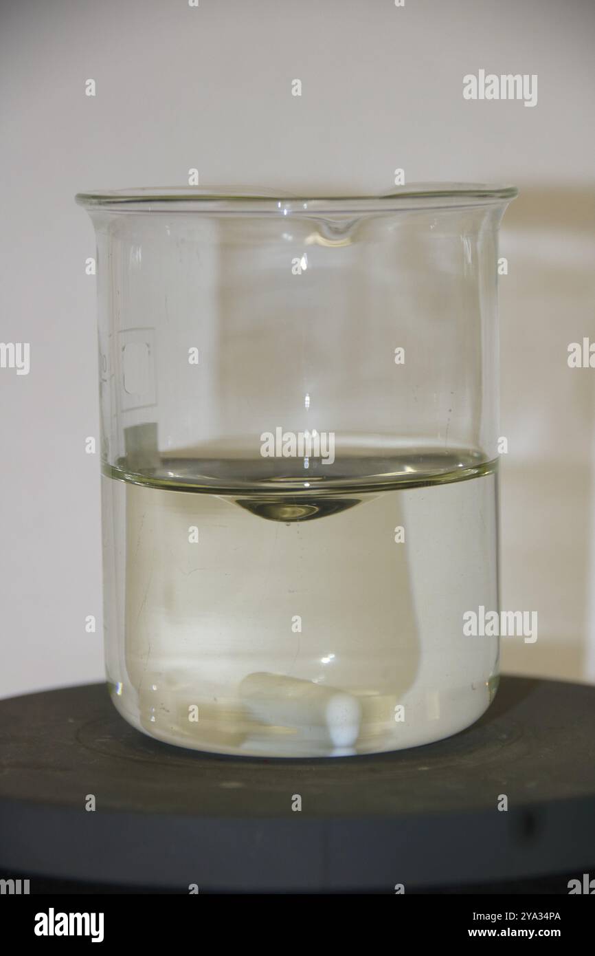 Stirring a water sample in the laboratory of a sewage treatment plant ...