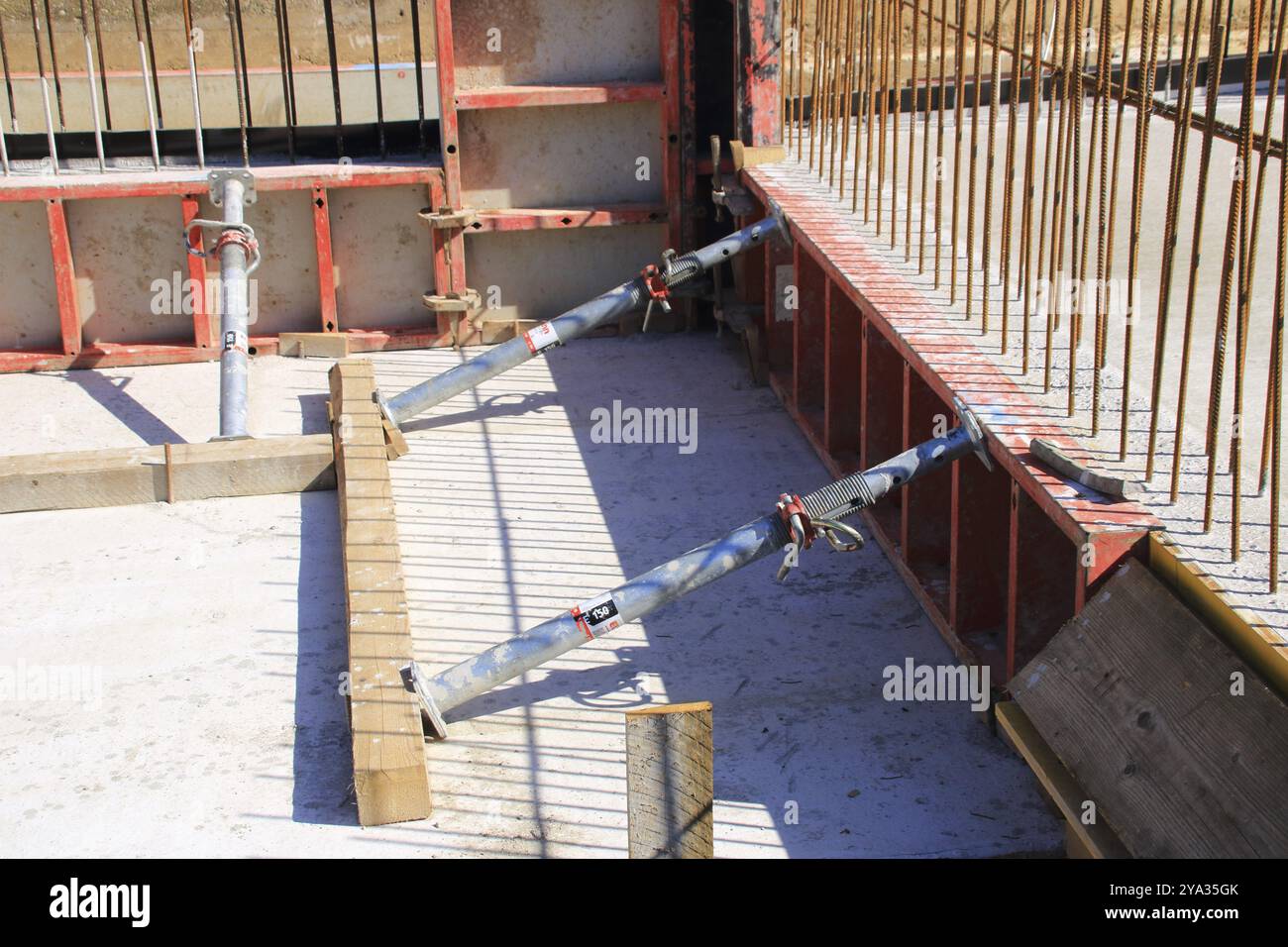 Formwork of a concrete wall was secured against slipping with struts ...