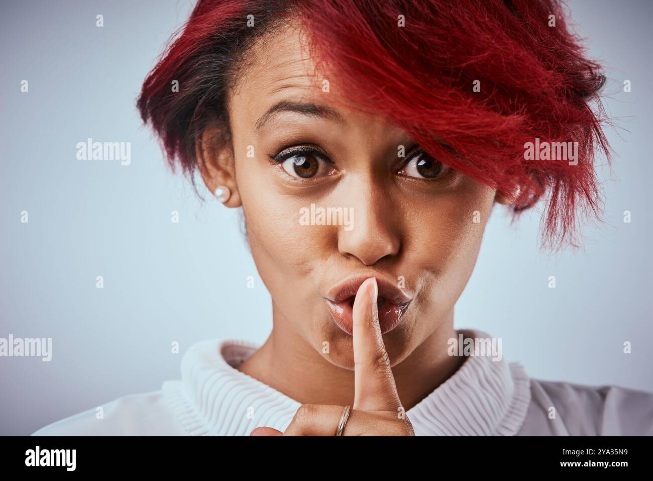 Secret, finger and portrait of woman in studio for gossip, silence and ...