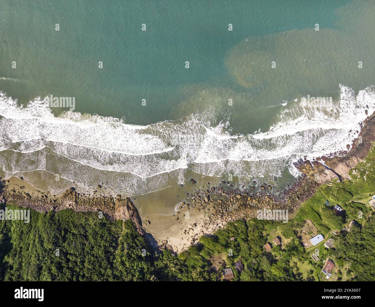 Coastline with beach, mountains and blue ocean with waves in Brazil ...