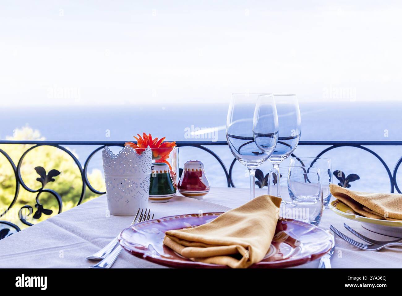 Dining table ready to receive guests at the Isle of Capri Stock Photo ...