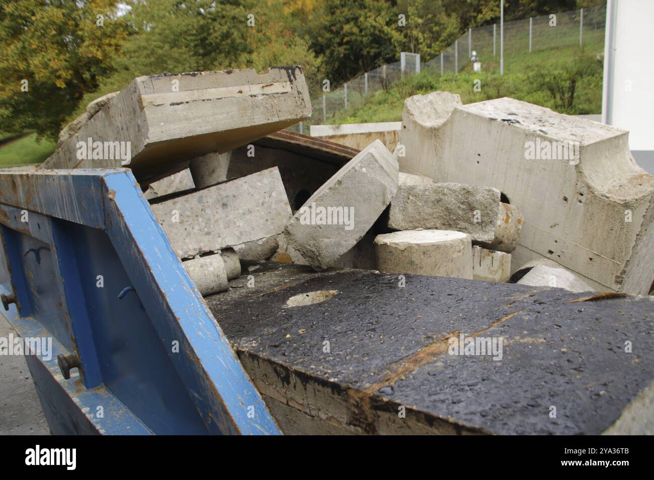 Concrete is stored in a container for removal Stock Photo - Alamy