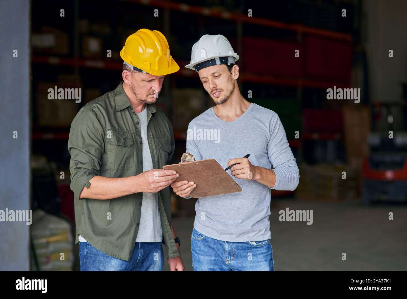 Construction, planning and clipboard of men for safety, inventory and ...