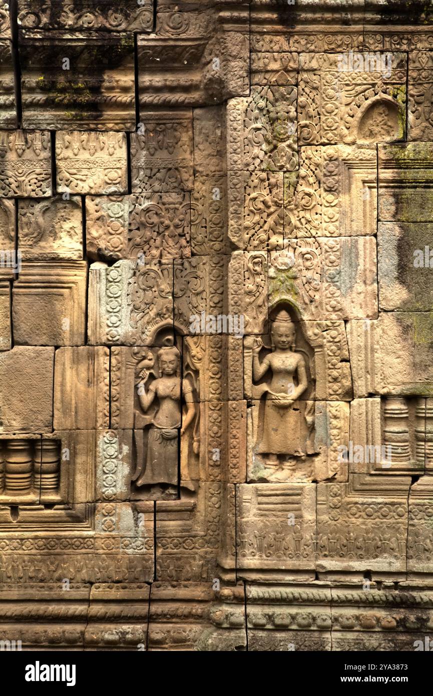 Relief of apsara figures on the wall of Banteay Prei Nokor, an ancient ...