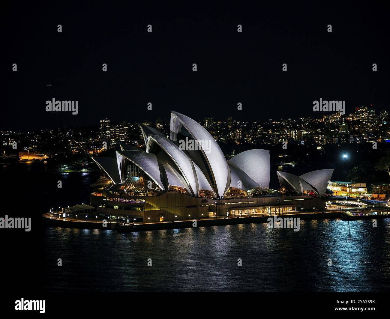 Sydney city harbour with opera house landmark skyline at night in ...
