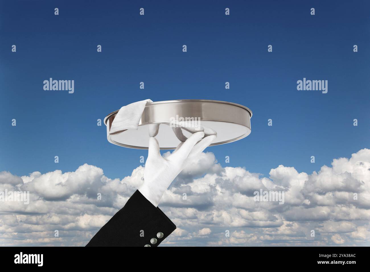 Waiter carrying silver tray hi-res stock photography and images - Alamy