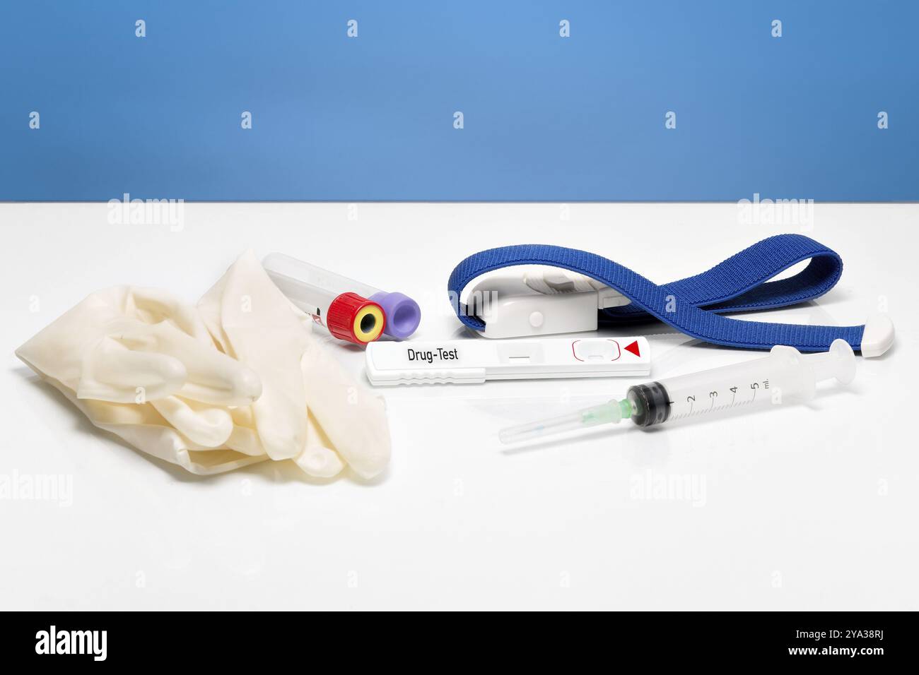 Rapid test for drugs on a laboratory paper with syringe and pipette ...