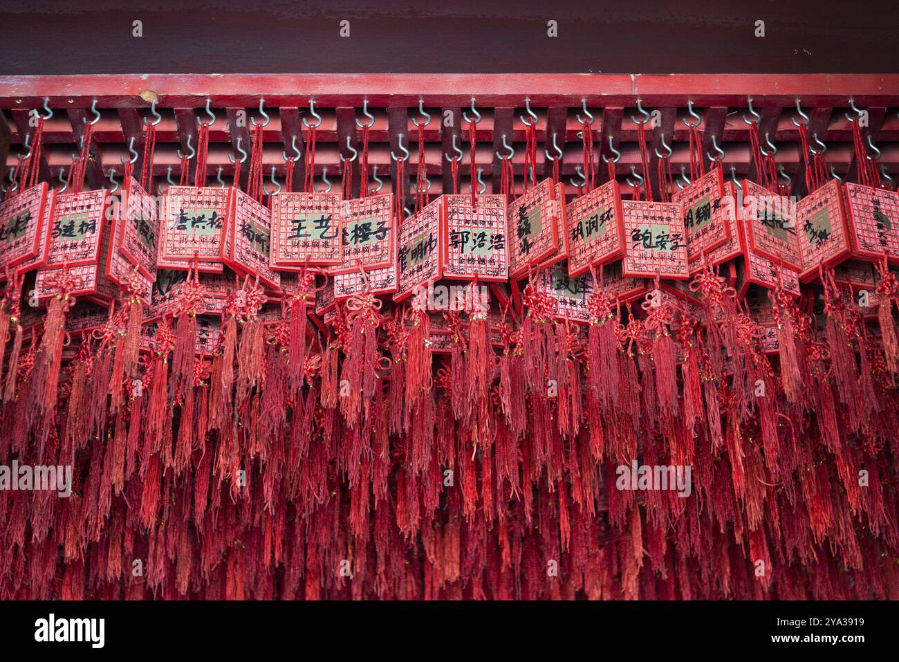 Traditional lucky wishes in chinese temple Stock Photo - Alamy
