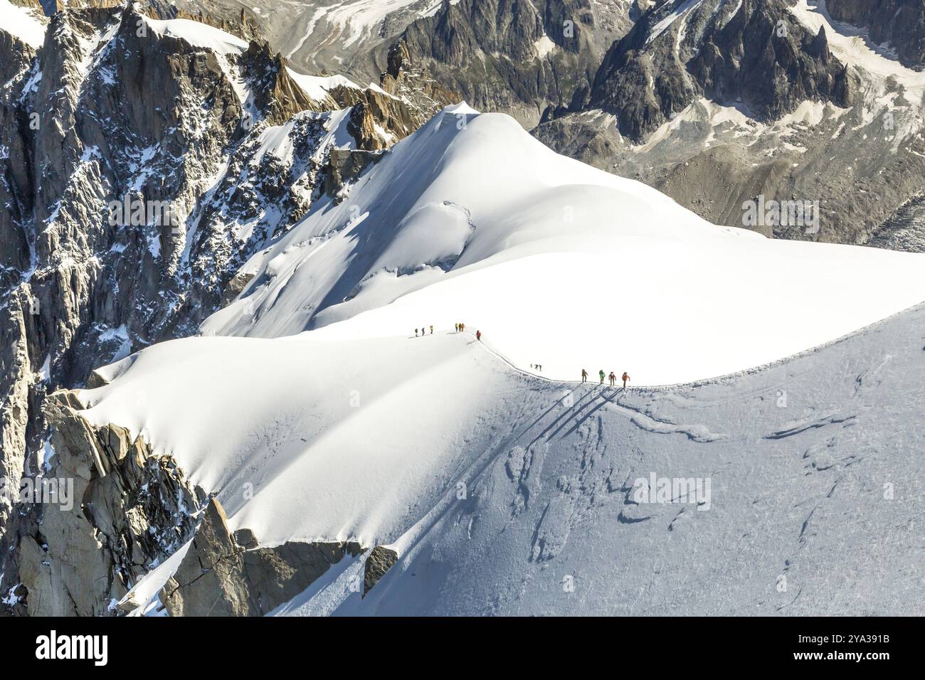 Mont Blanc mountaneers walking on snowy ridge Stock Photo - Alamy