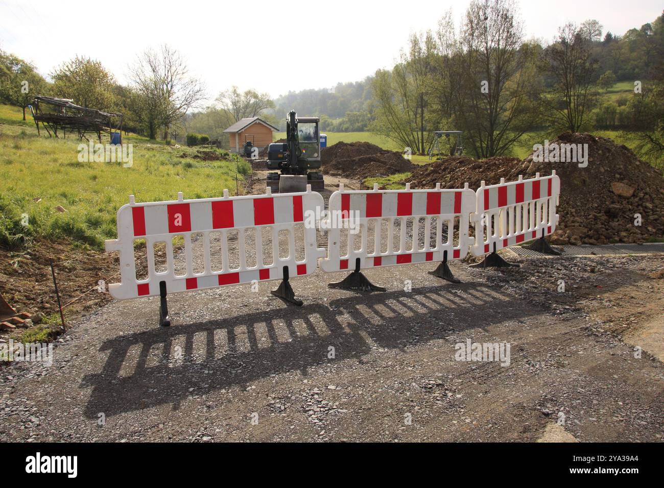 Barrier at a road construction site The construction site is secured ...