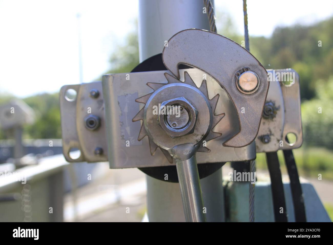 Pawl and ratchet wheel on a stainless steel cable winch Stock Photo - Alamy