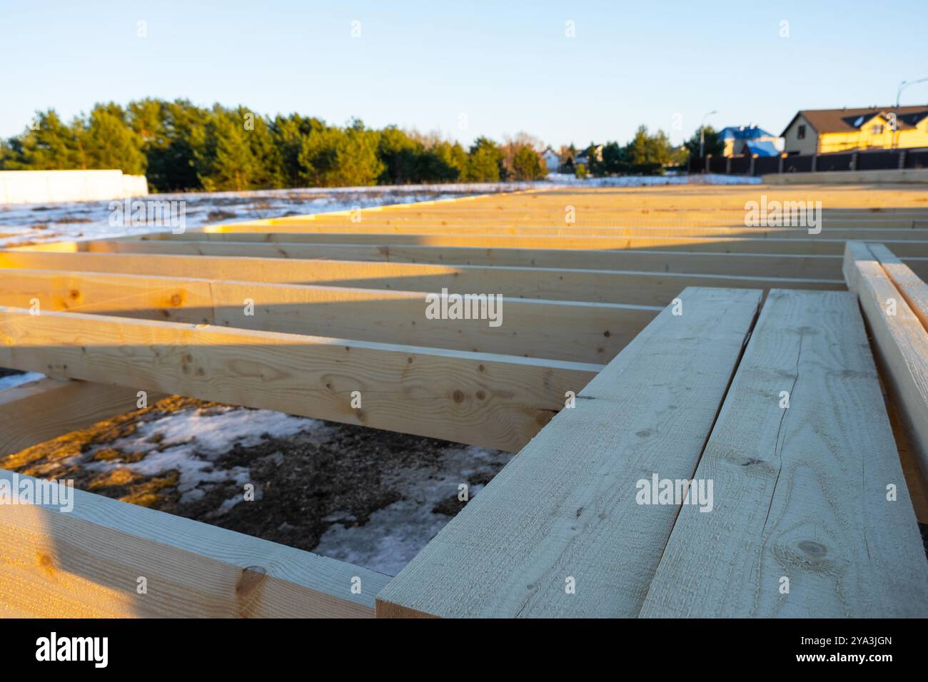 The foundation of a wooden frame house on stilts is a construction site ...