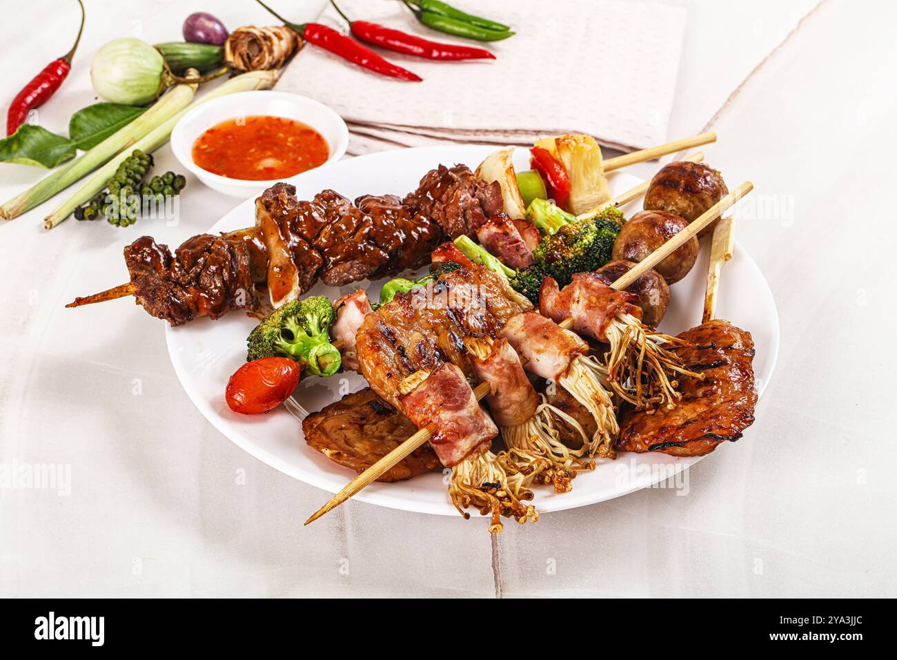 Asian grilled skewer assortment satay with beef, porl, chicken and ...