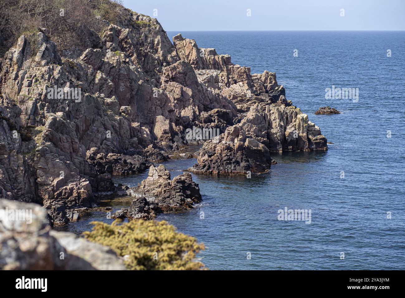 Molle, Sweden, May 3, 2022: Rocky cliffs at Kullaberg Nature Reserve in ...