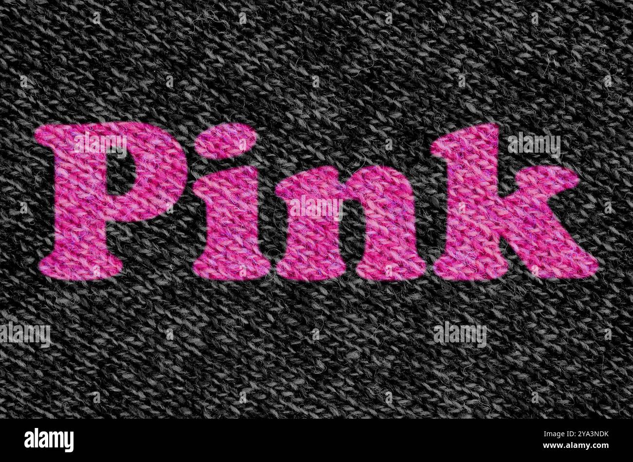 The Word Pink On Black Wool In Pink Die Stock Photo - Alamy