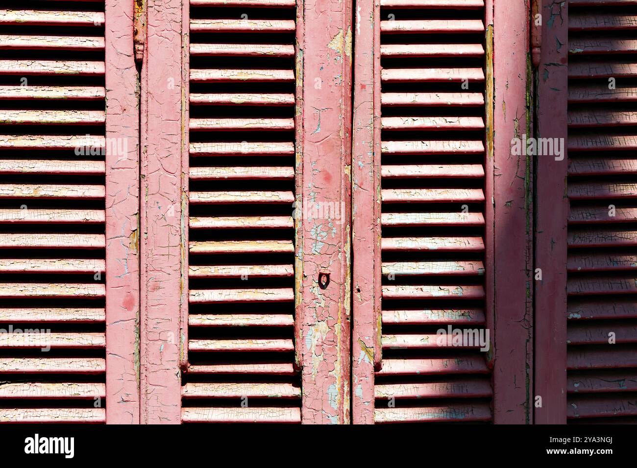 Pink wooden shutters, background with textures and copy space for the ...