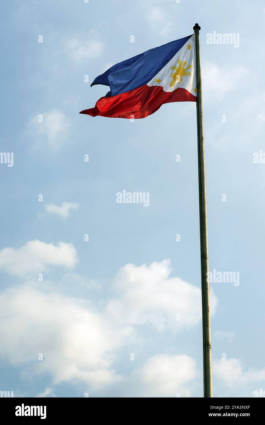 Philippines filipino flag flying on flagpole in manila Stock Photo - Alamy