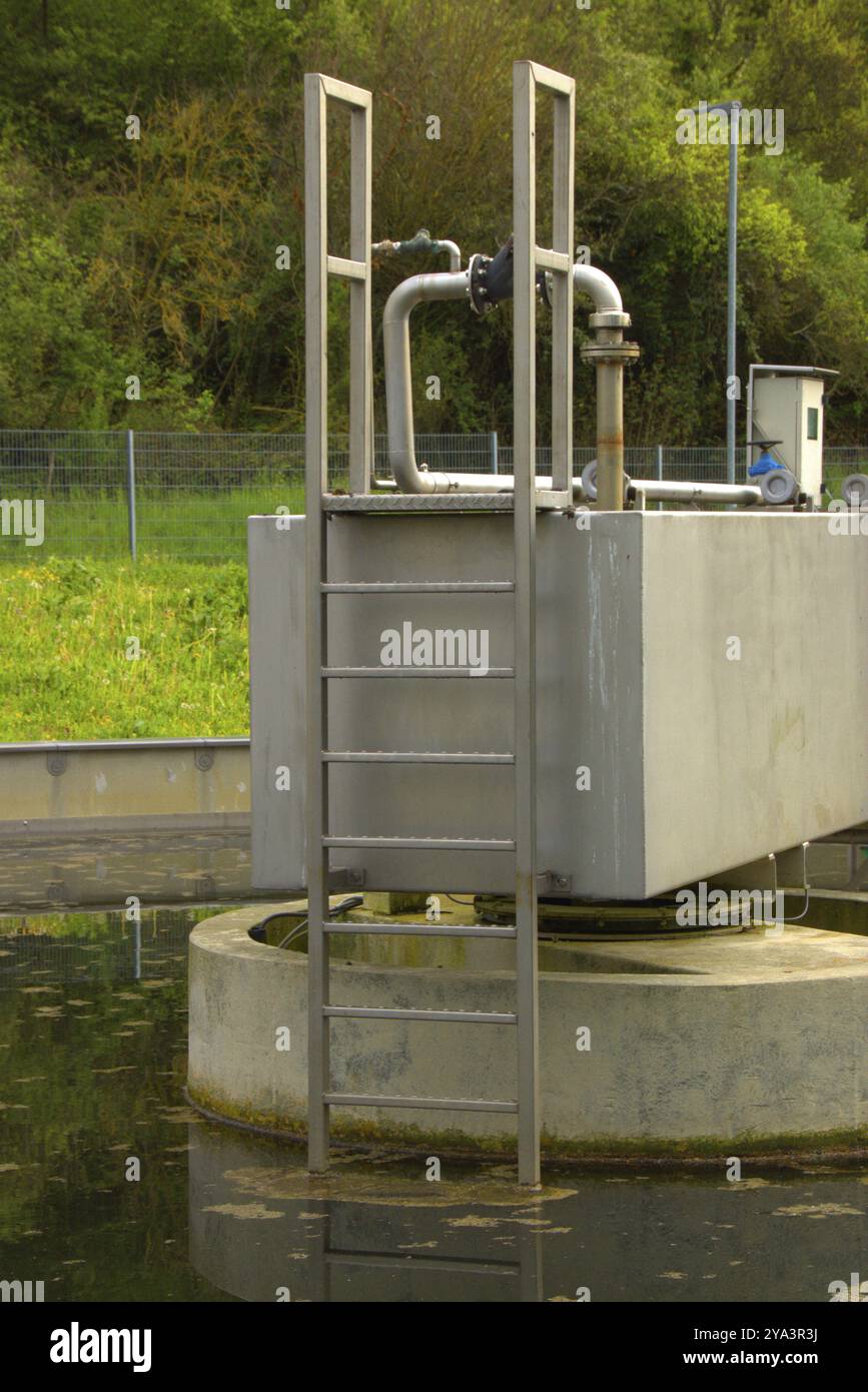 Exit ladder from a secondary clarifier in a sewage treatment plant ...