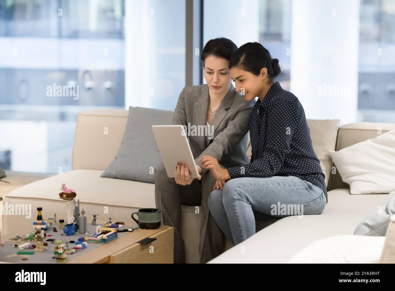 Diverse female teacher tablet hi-res stock photography and images - Alamy