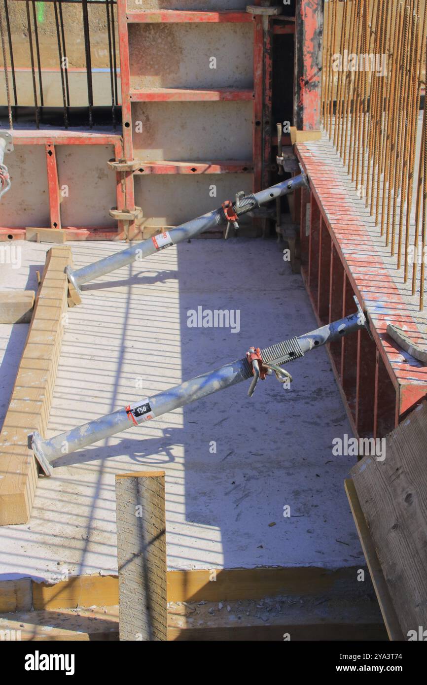 Formwork of a concrete wall was secured against slipping with struts ...