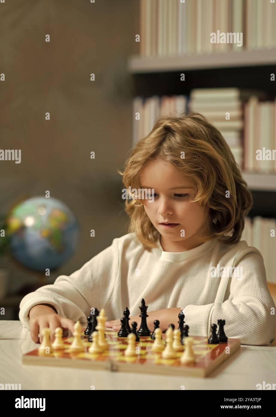 Little kid chessman play chess game, checkmate Stock Photo - Alamy
