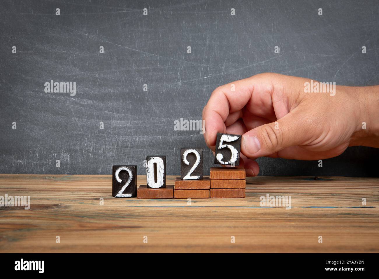 2025. Wooden letters, alphabet blocks on steps. development and growth ...