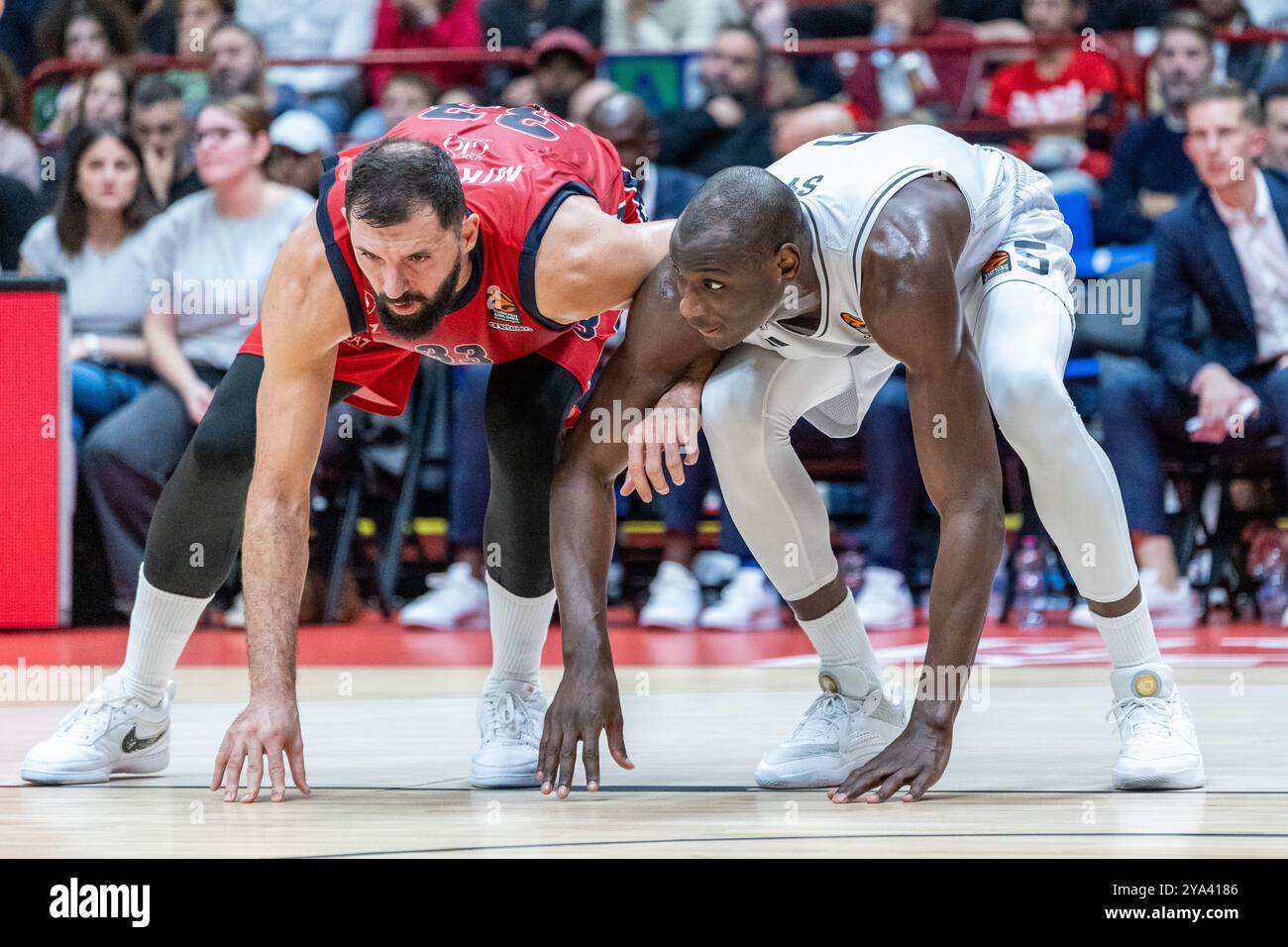 Nikola Mirotic #33 of EA7 Emporio Armani Milan and Bandja Sy #5 of ...