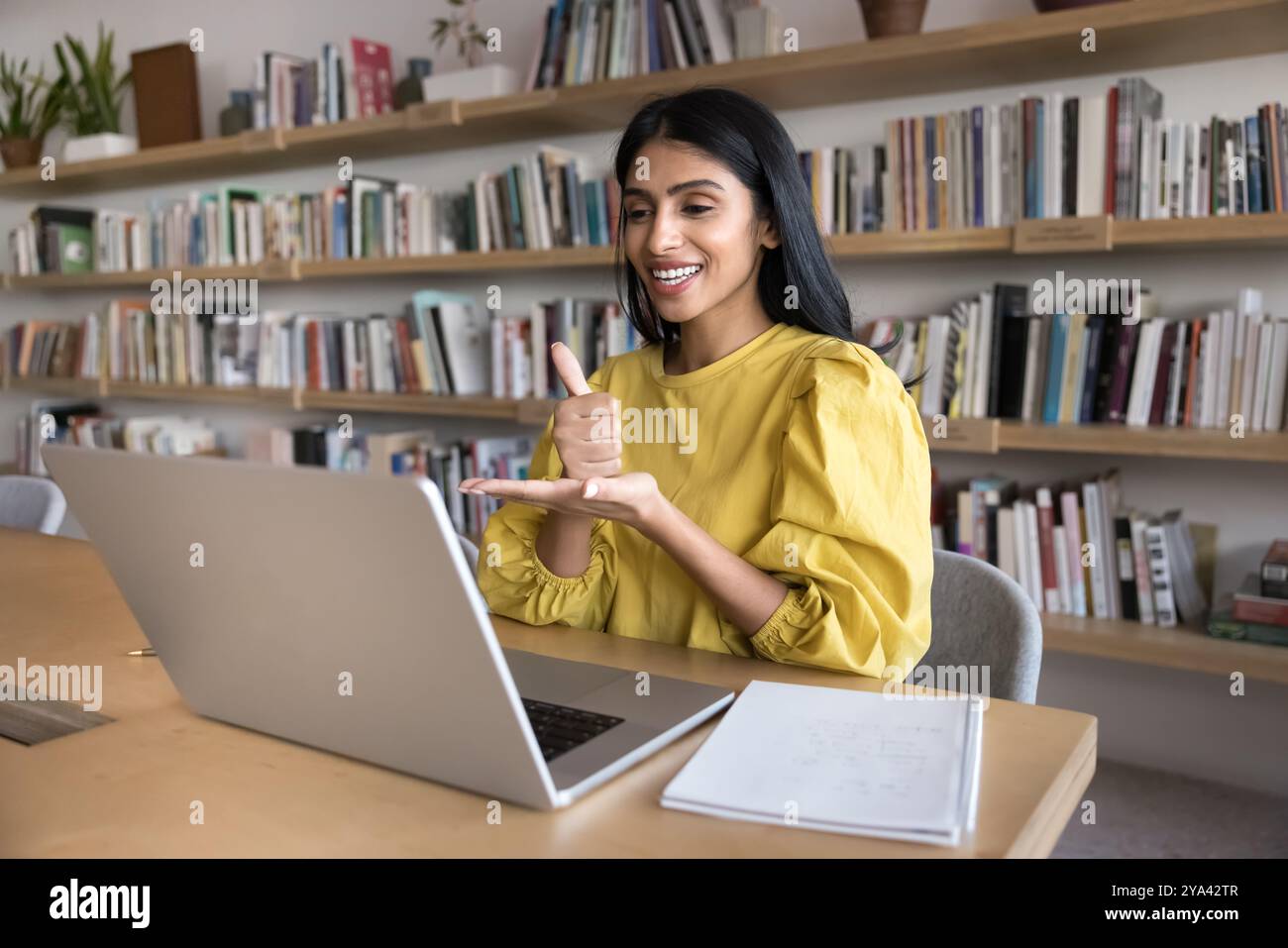 Sign language therapist talking on video call Stock Photo - Alamy