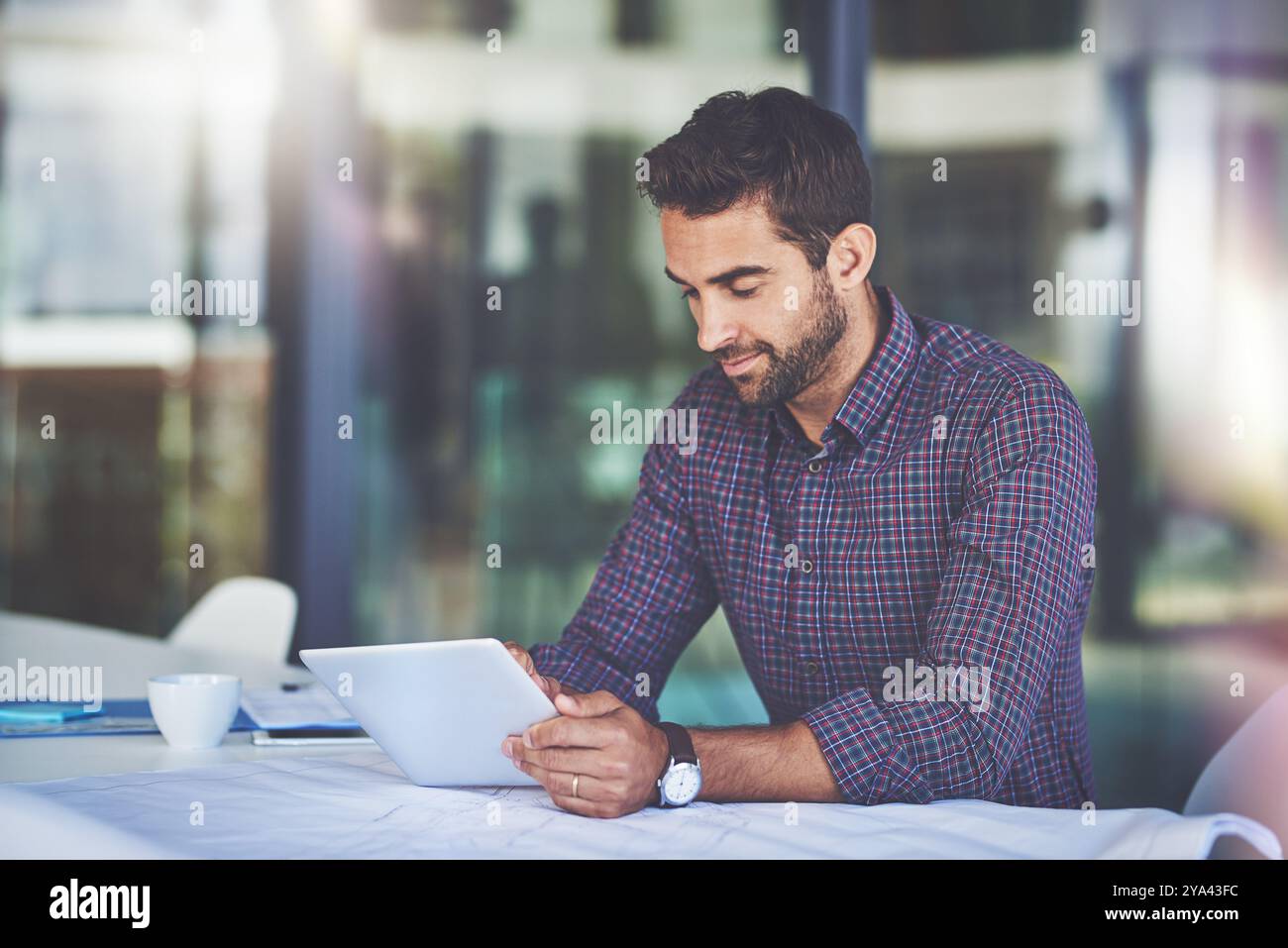 Tablet, architecture and blueprint with business man in office for ...
