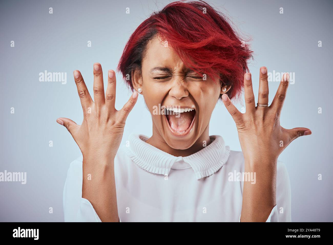 African woman, screaming and hair care in studio for mistake, texture ...