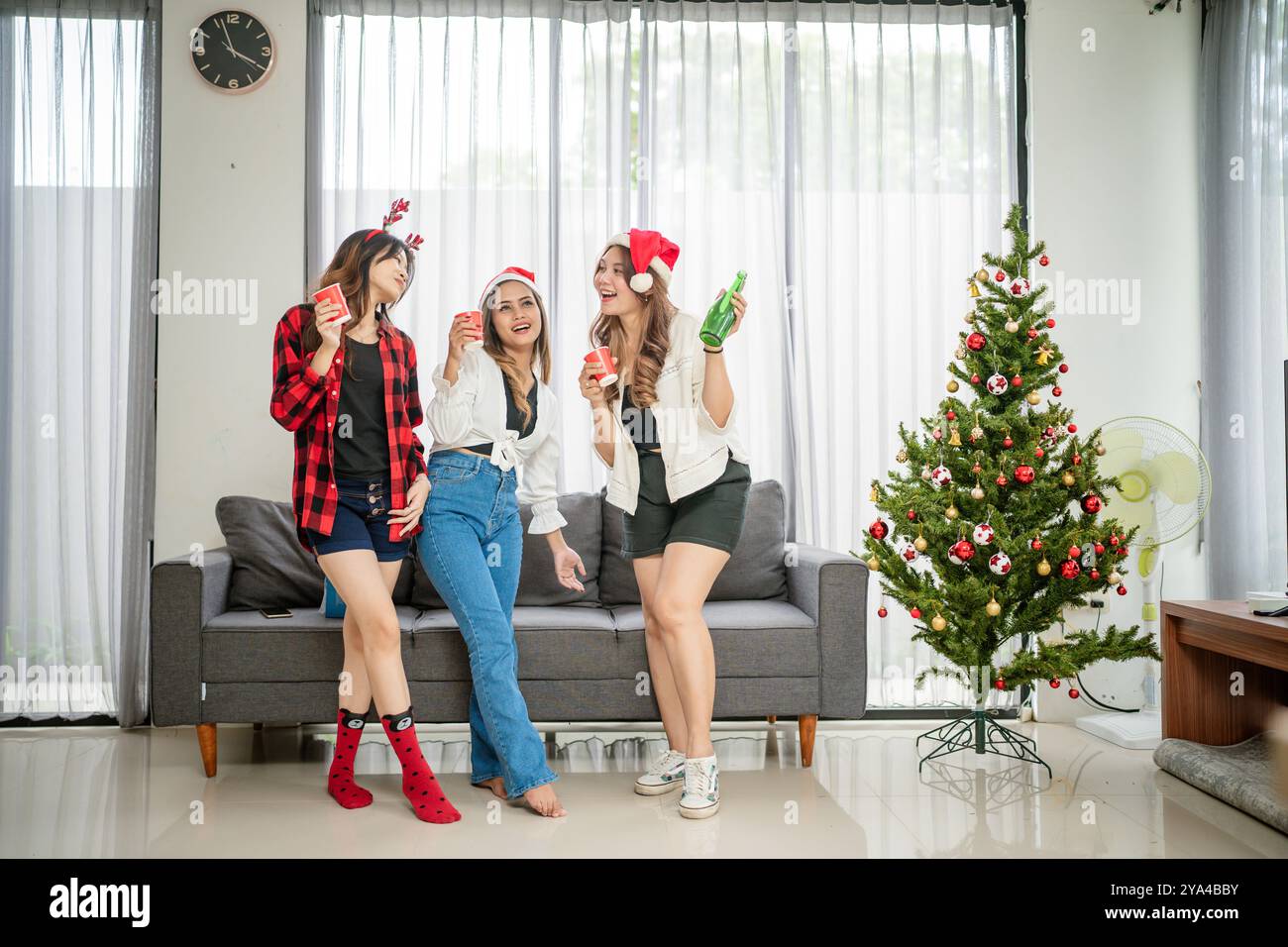 group girls having fun christmas party Stock Photo - Alamy