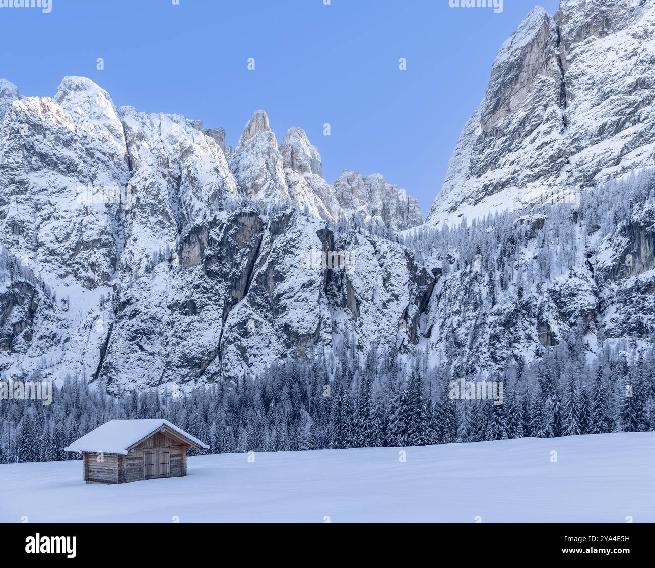 A winter fairytale in the Italian Alps, featuring a snow-covered cabin ...